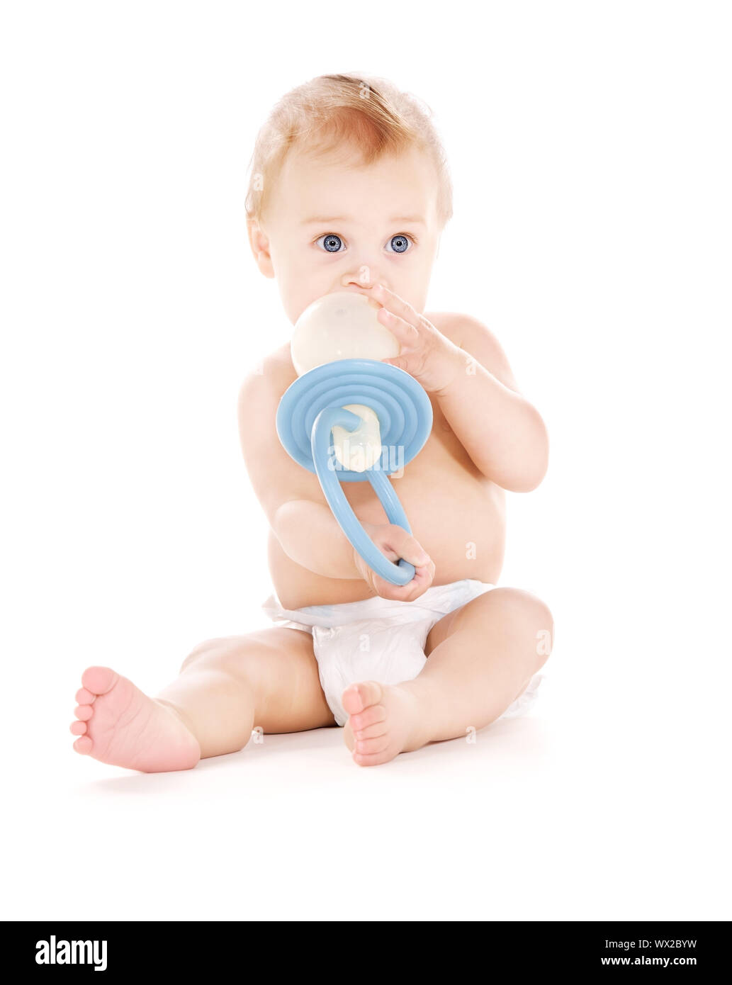 picture of baby boy with big pacifier over white Stock Photo - Alamy