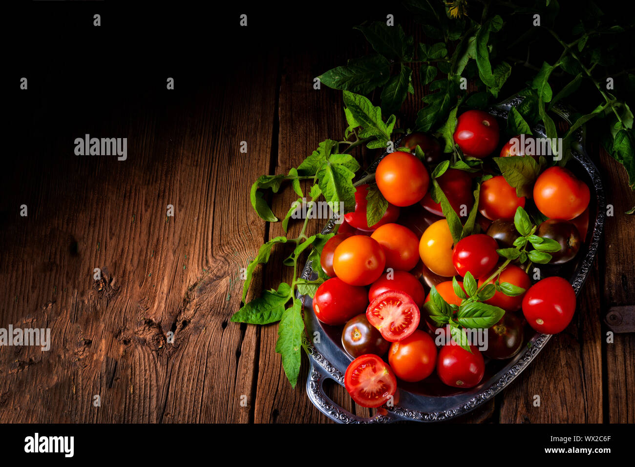 various types of tomatoes served and presented on the silver platter ...
