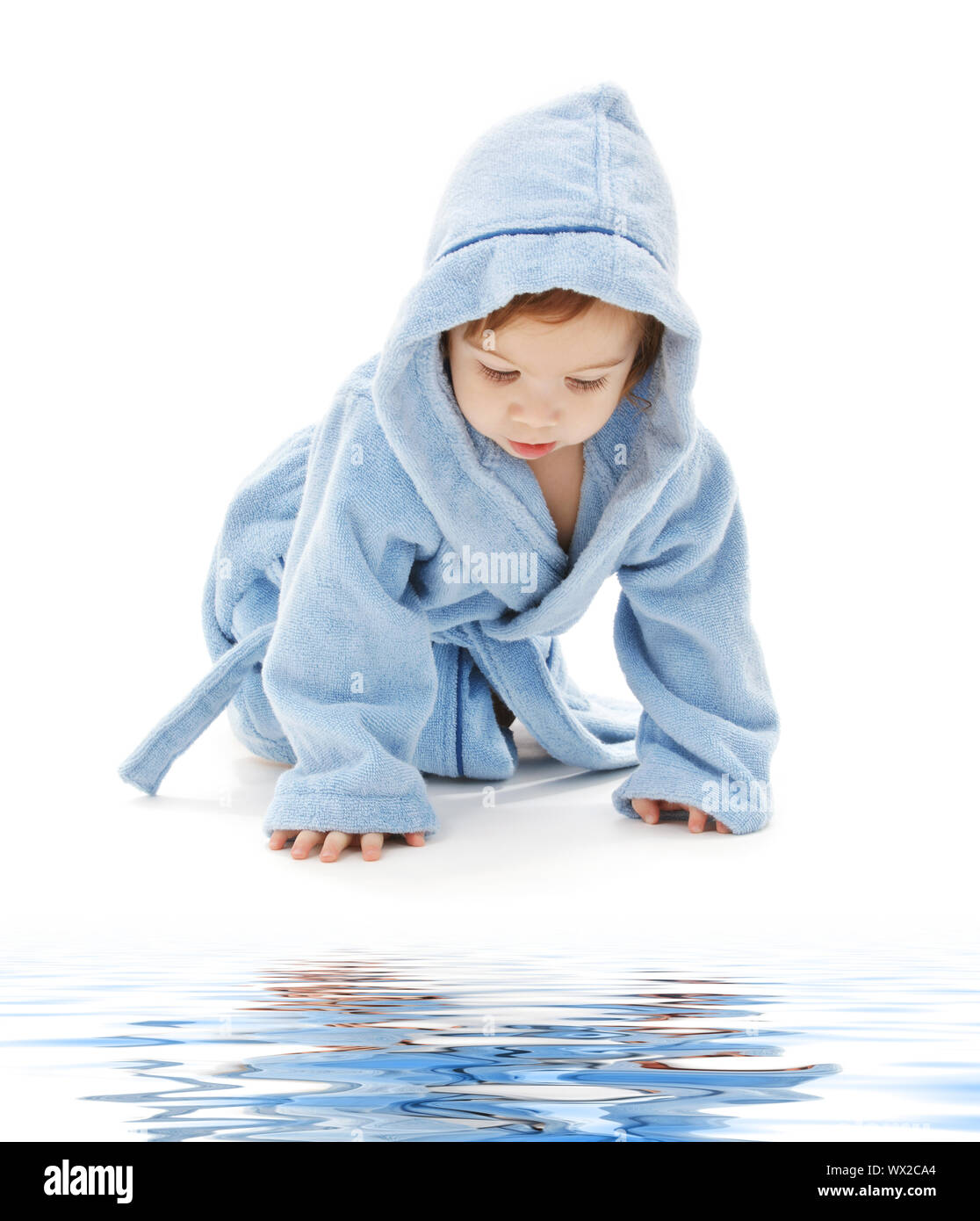 baby boy in blue robe over white Stock Photo - Alamy