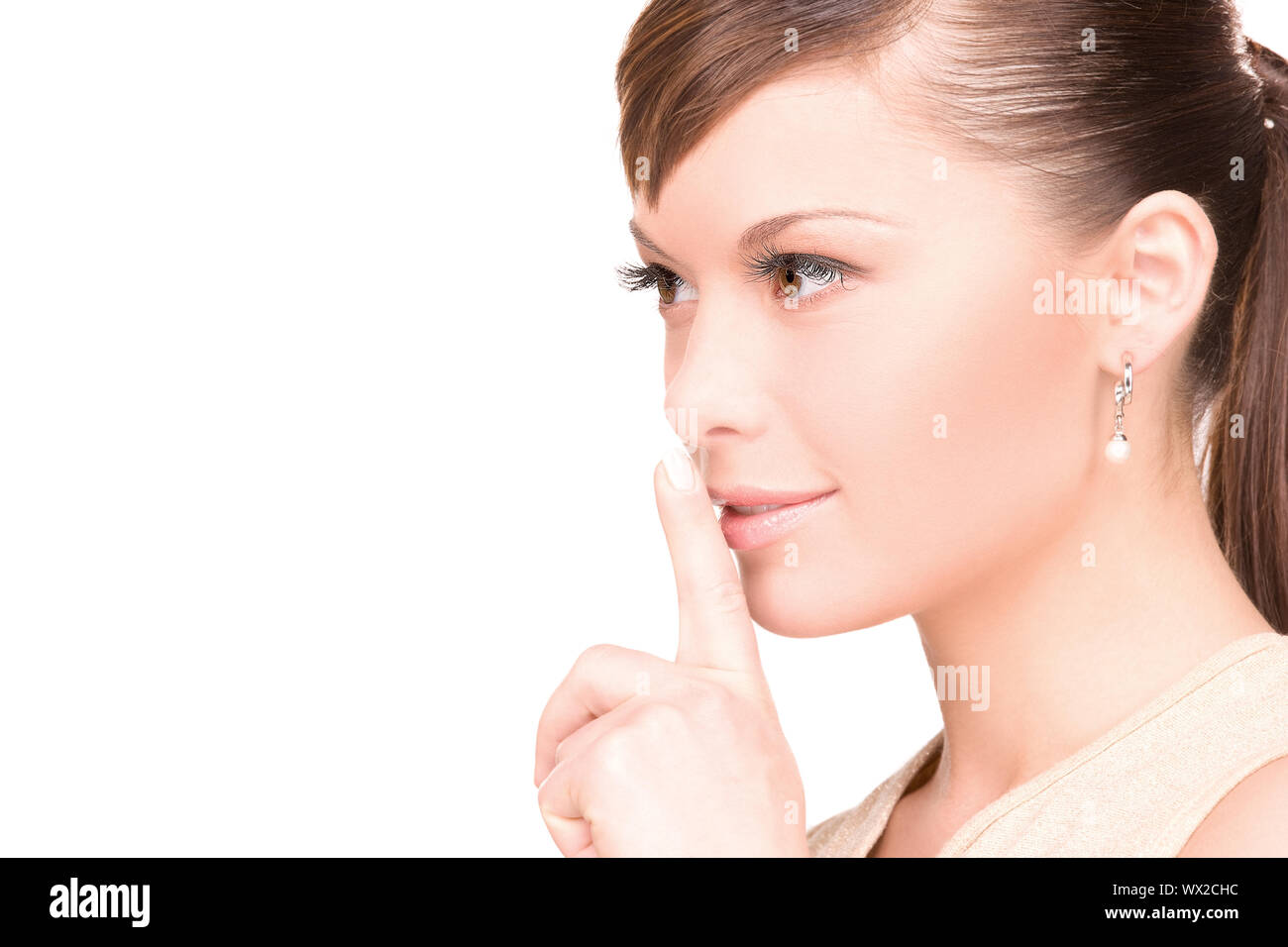 finger on lips Stock Photo - Alamy