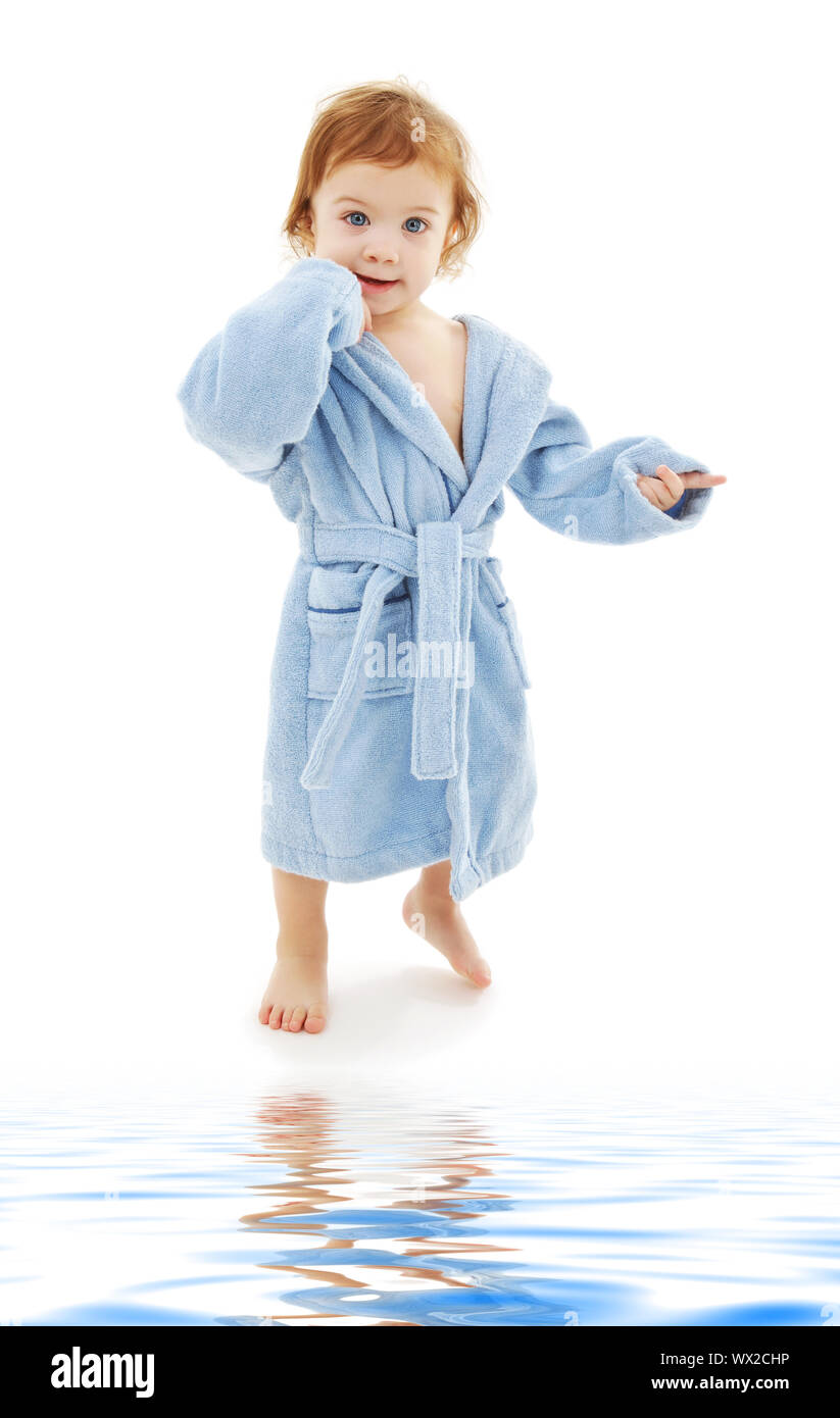 baby boy in blue robe over white Stock Photo - Alamy