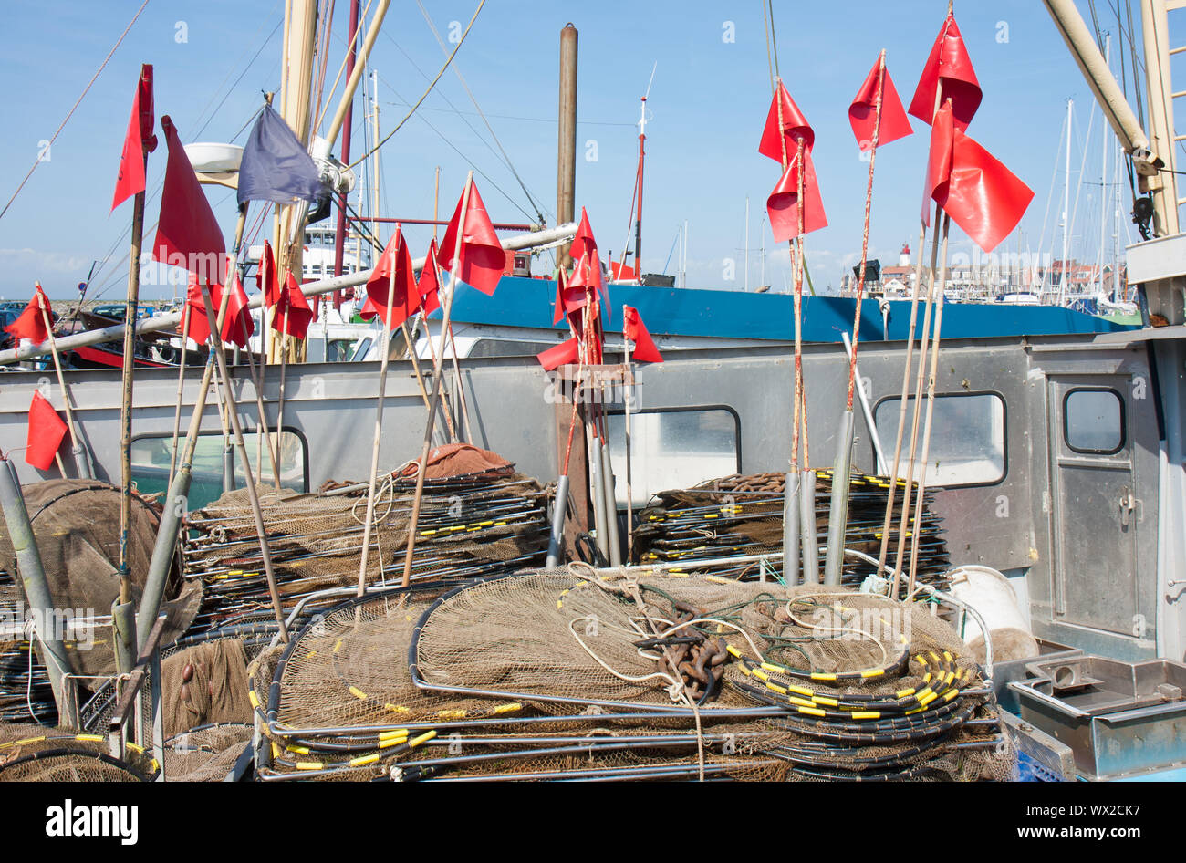 Fishing ship with nets in harbor of Urk, a Dutch fishing village Stock ...