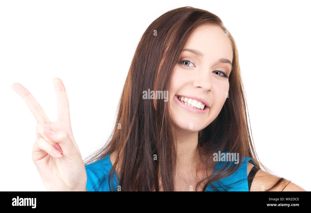 bright picture of lovely girl showing victory sign Stock Photo - Alamy
