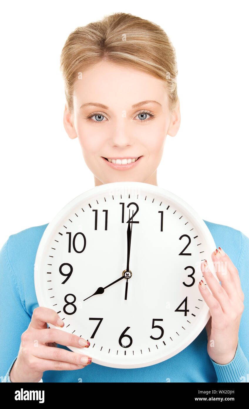 woman holding big clock Stock Photo - Alamy