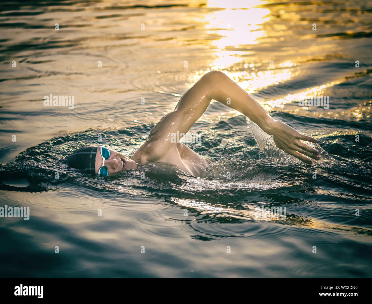 Swimmer breathing during swimming crawl Stock Photo - Alamy