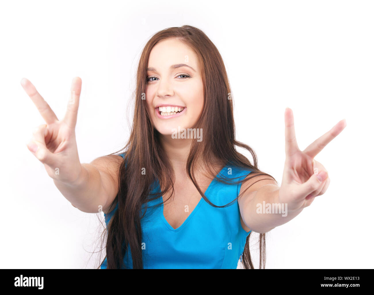 bright picture of lovely girl showing victory sign Stock Photo - Alamy