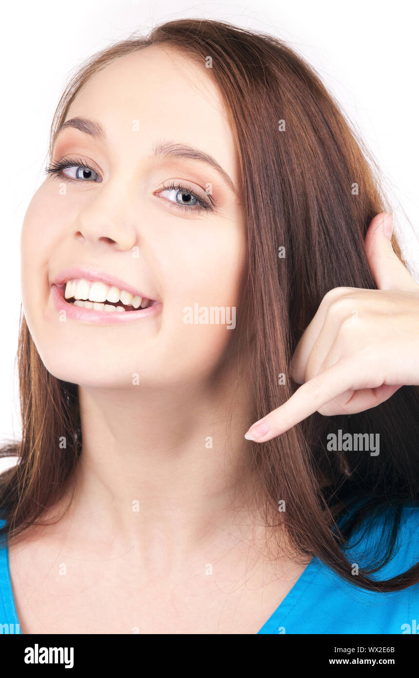 picture of lovely girl making a call me gesture Stock Photo - Alamy