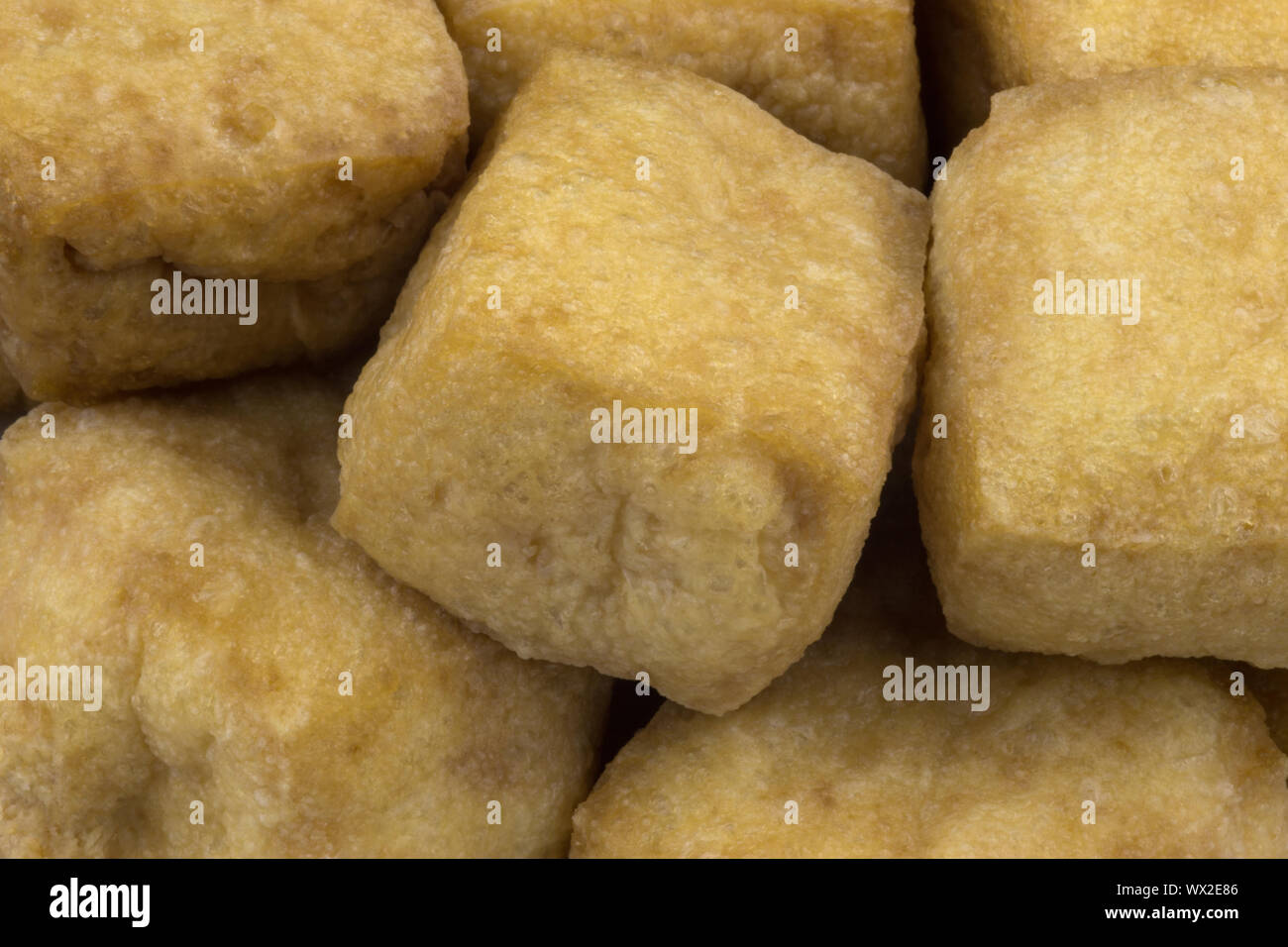 Fried soya bean curd or tofu cubes close up Stock Photo - Alamy