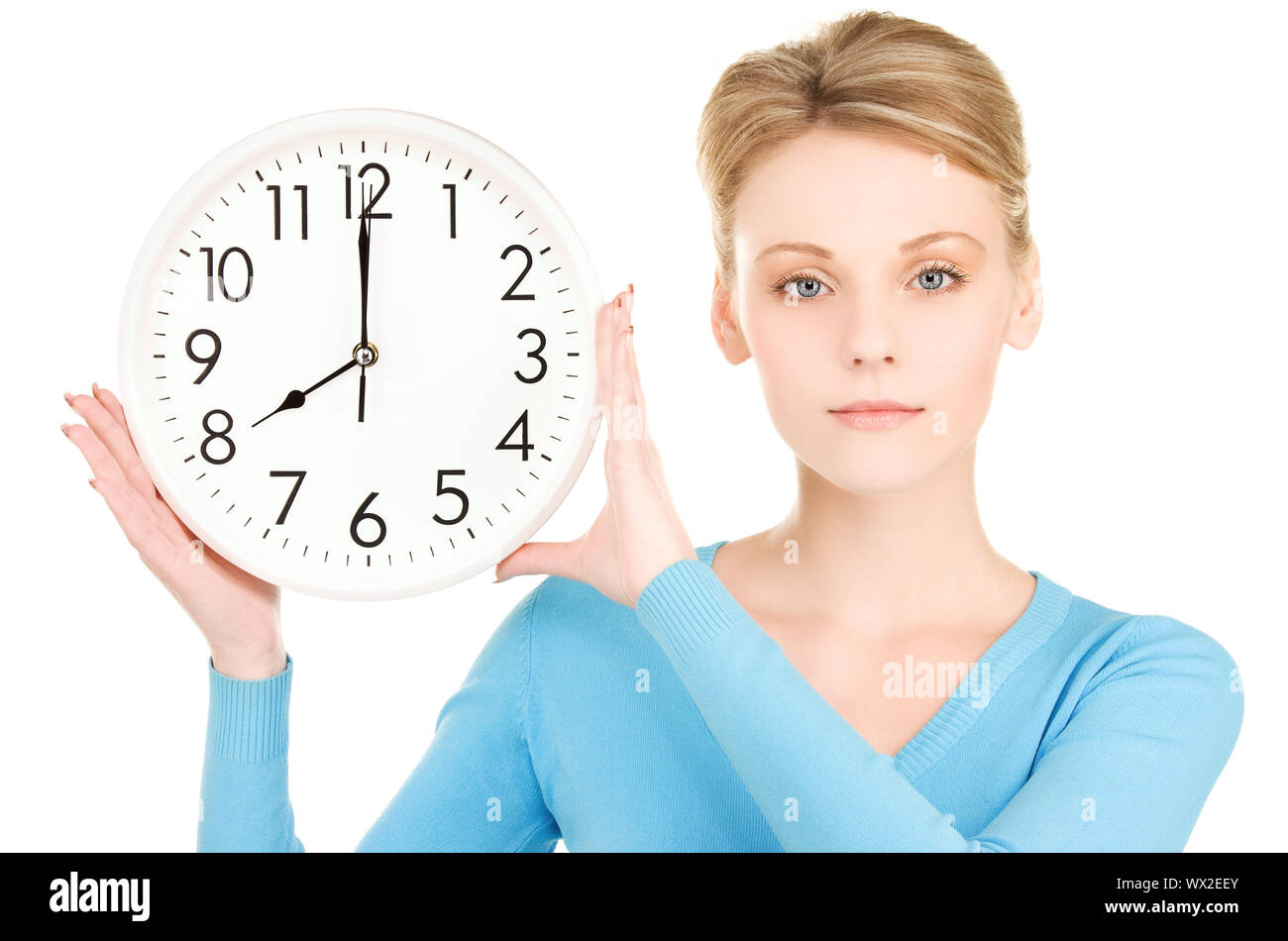woman holding big clock Stock Photo - Alamy