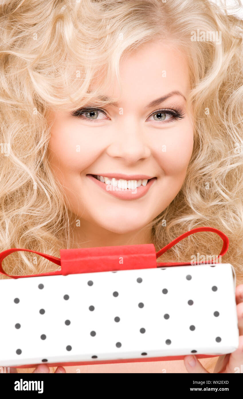 happy girl with gift box over white Stock Photo - Alamy