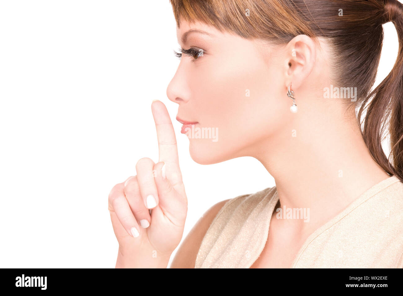 finger on lips Stock Photo - Alamy