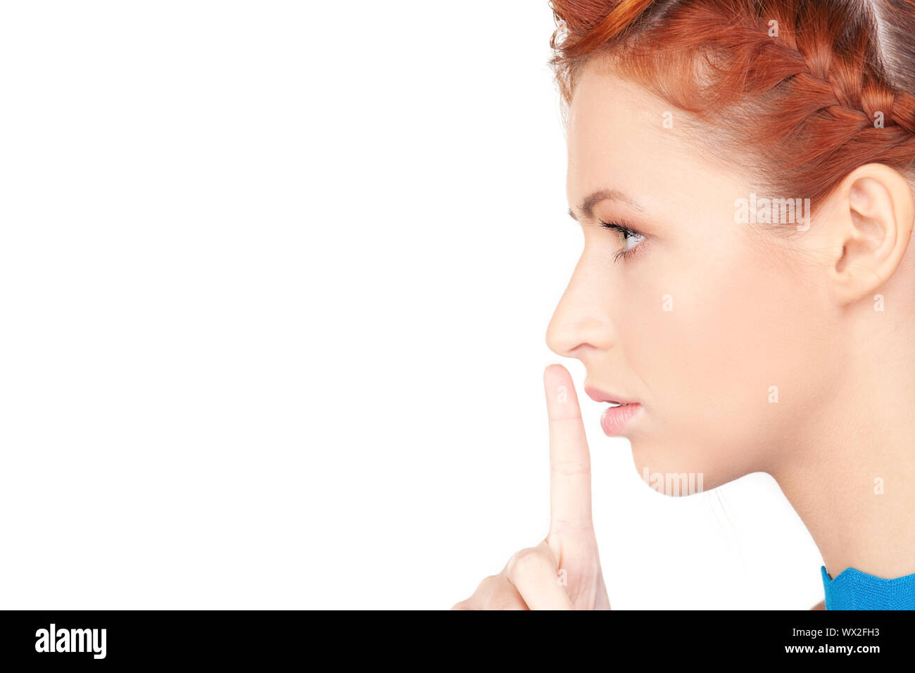 finger on lips Stock Photo - Alamy