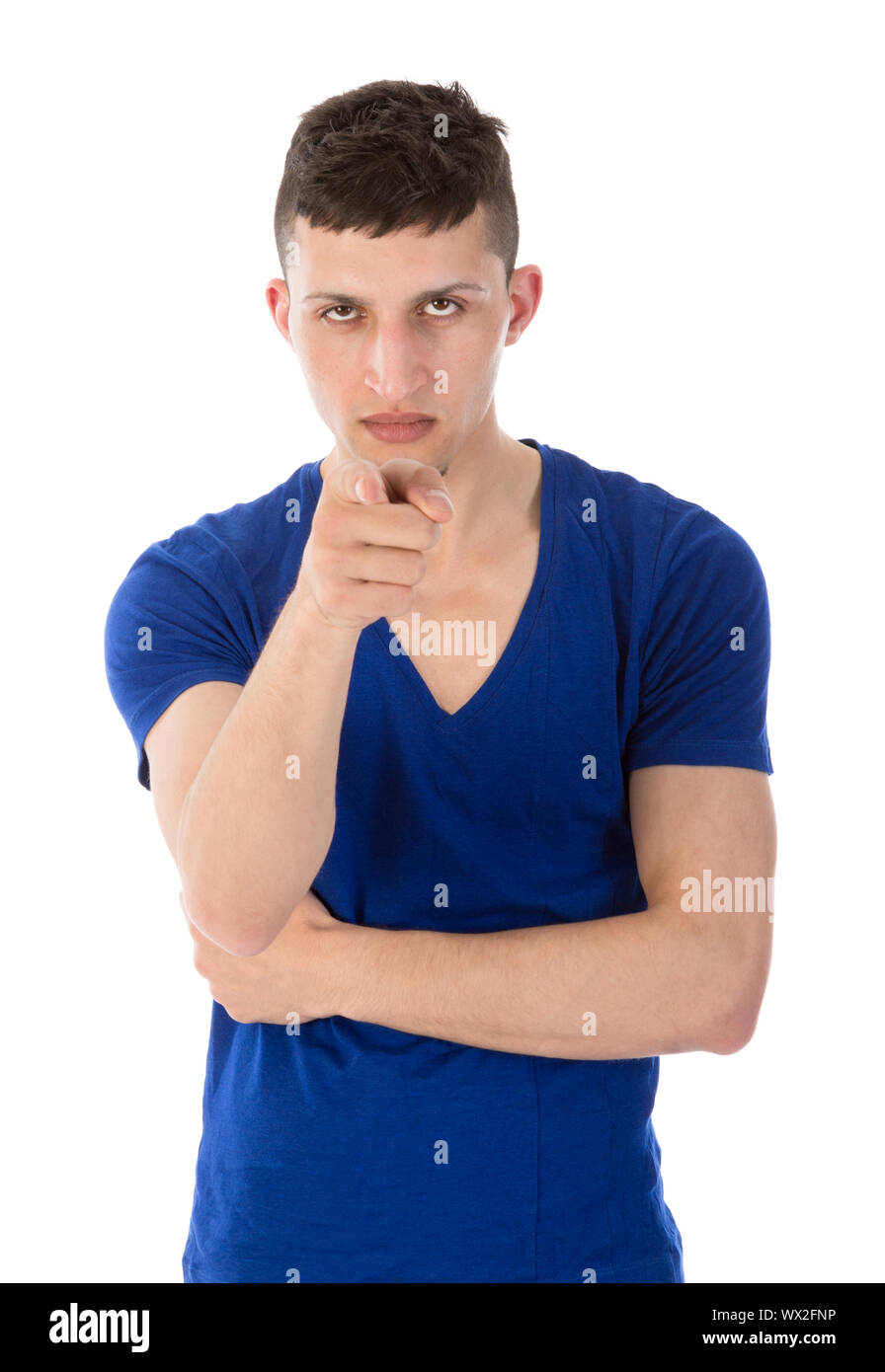 Angry young man pointing a finger towards you; isolated on white Stock ... Angry young man pointing a finger towards you; isolated on white Stock ...