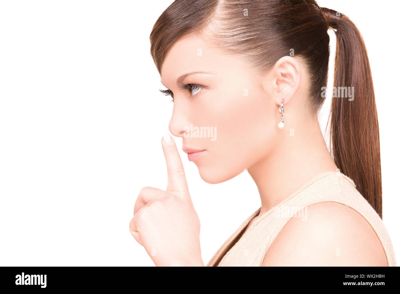 finger on lips Stock Photo - Alamy