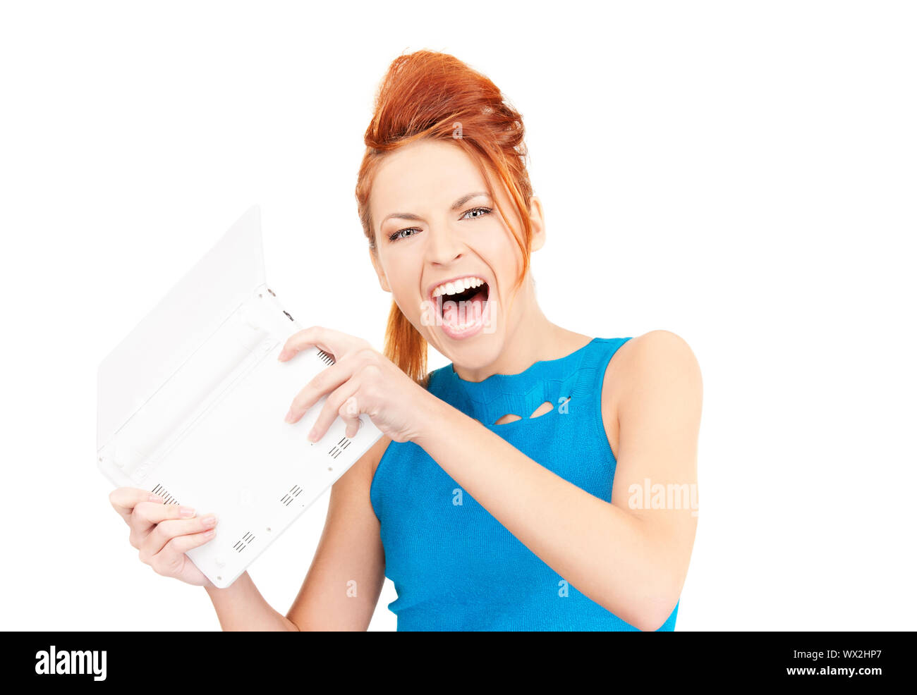 angry woman with laptop computer Stock Photo - Alamy