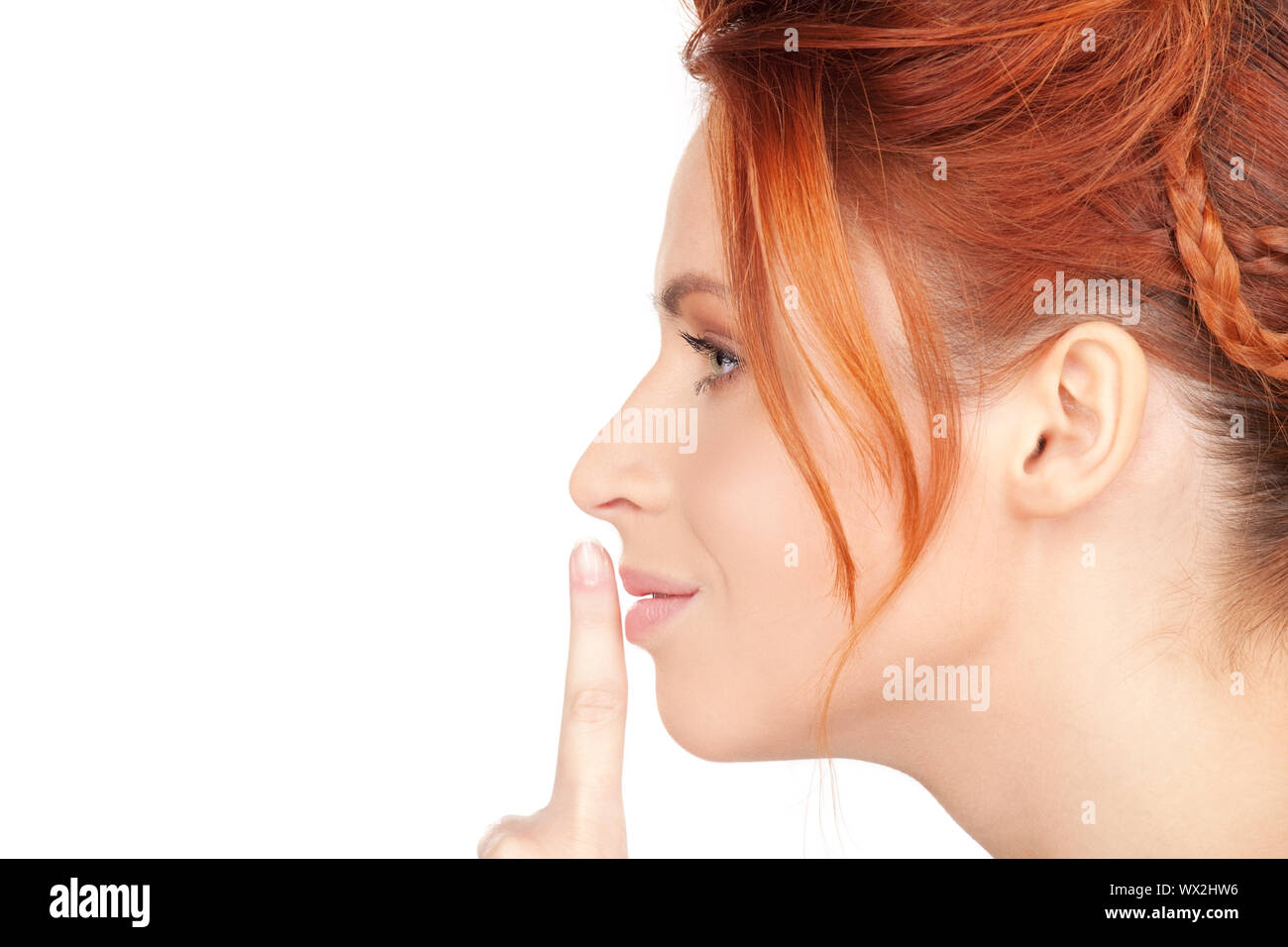 finger on lips Stock Photo - Alamy