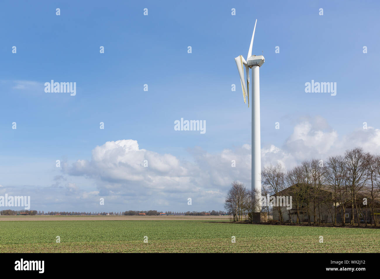 Farmland with damaged wind turbine after a heavy storm in the ...