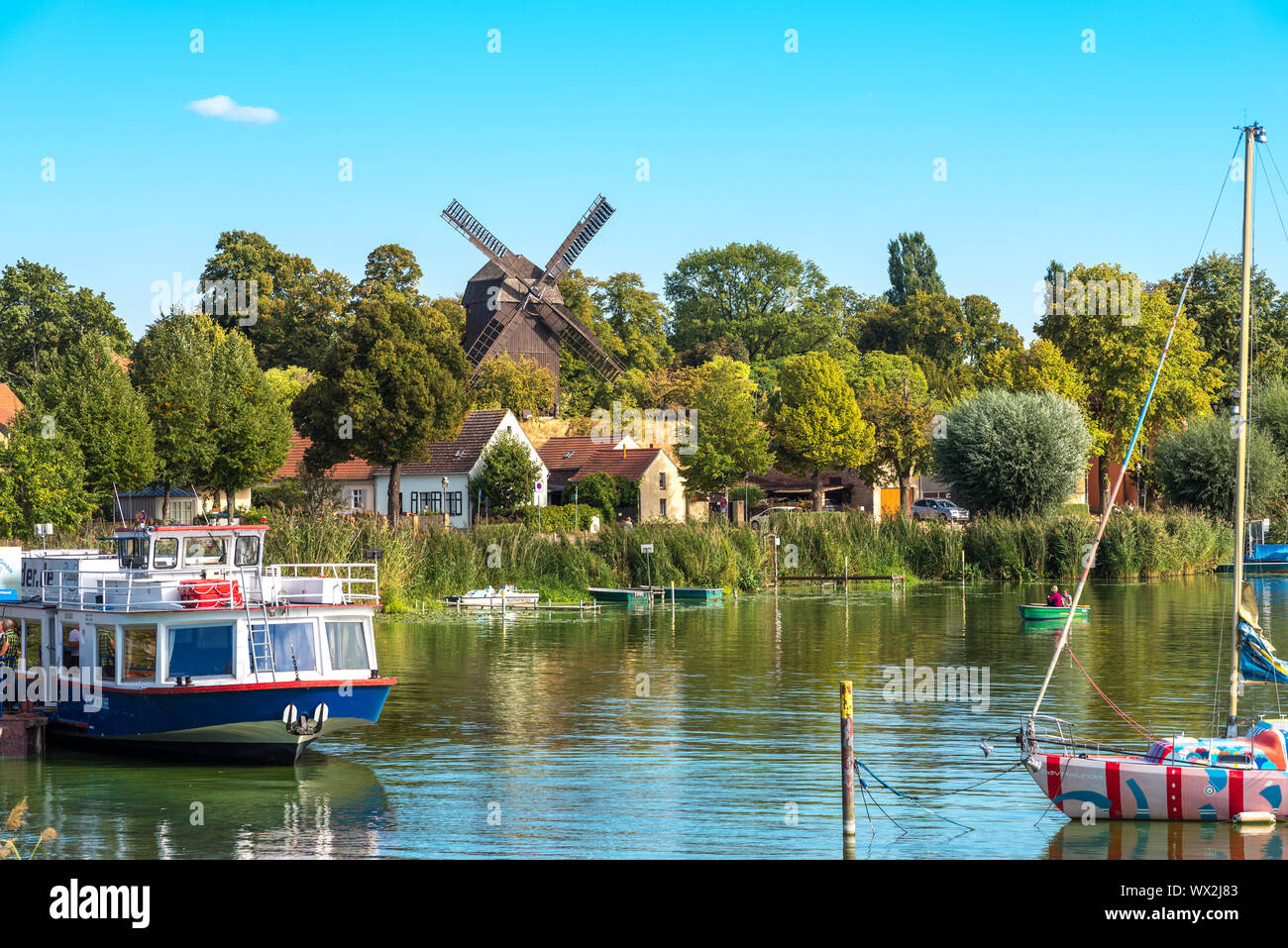 Floating boat mill river hi-res stock photography and images - Alamy