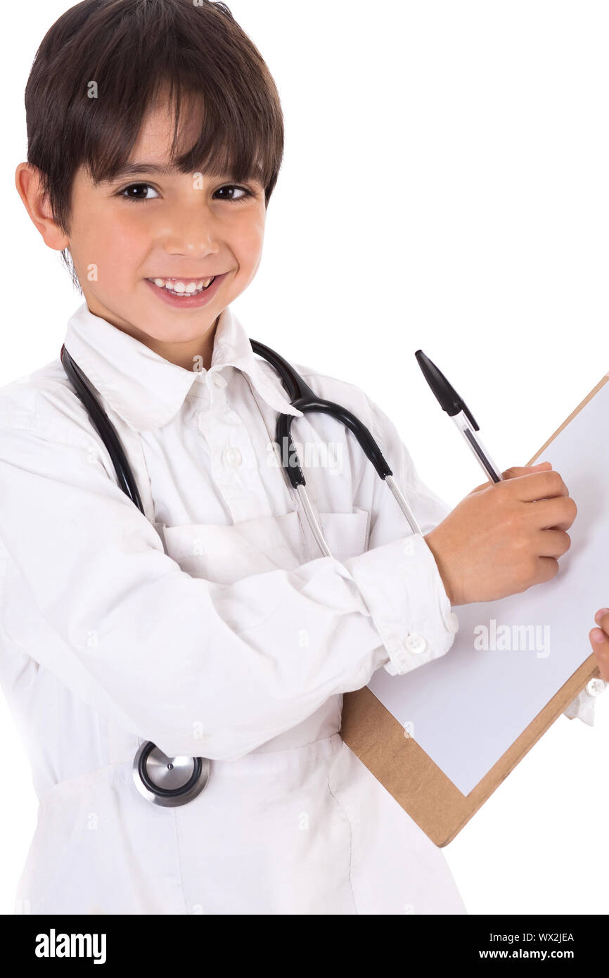 Little boy doctor writes on his clipboard for diagnosis on white ...