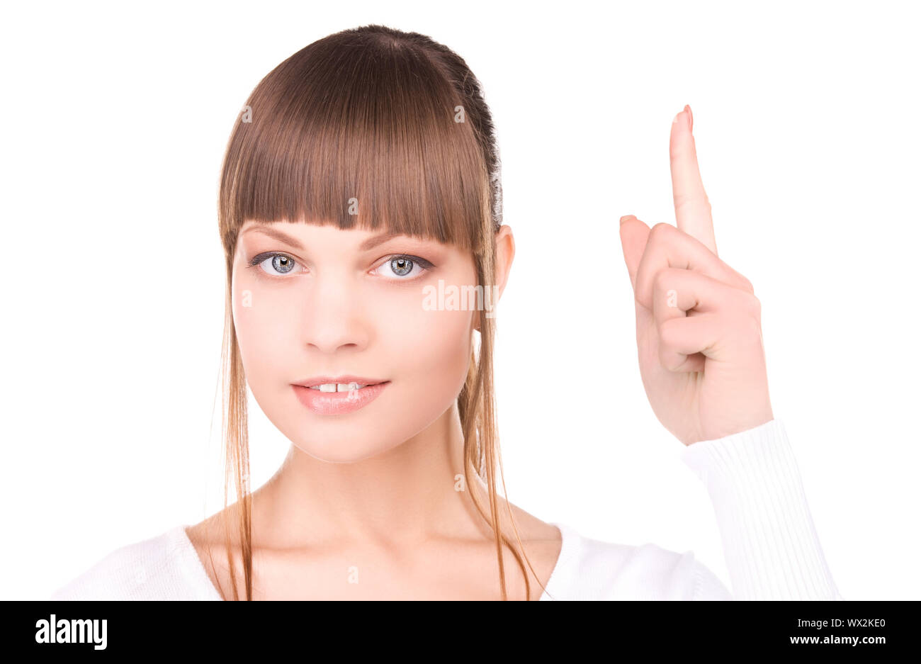 picture of attractive young woman with her finger up Stock Photo - Alamy