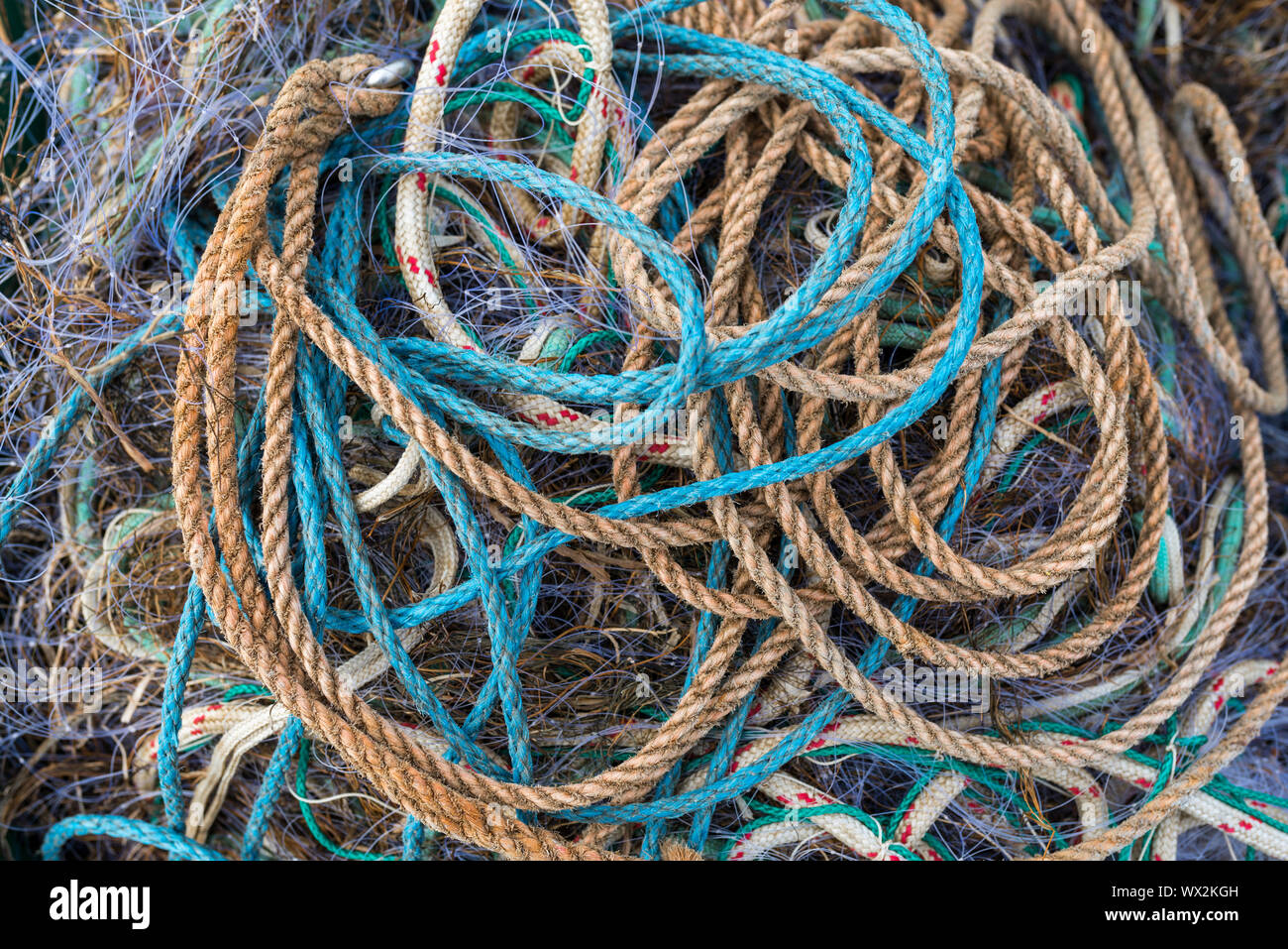 Barrel, rope and fishing net Stock Photo - Alamy