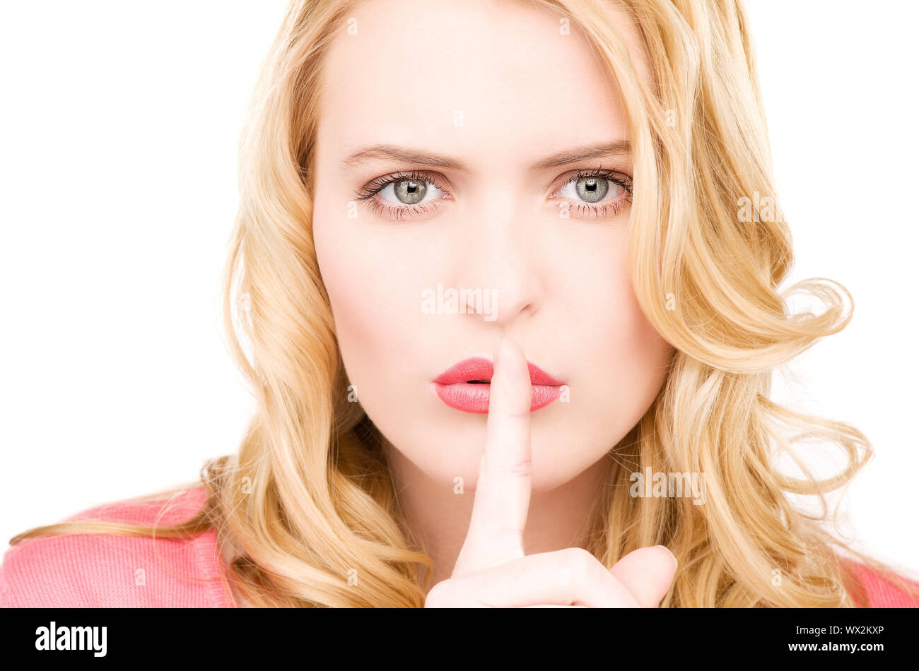 finger on lips Stock Photo - Alamy