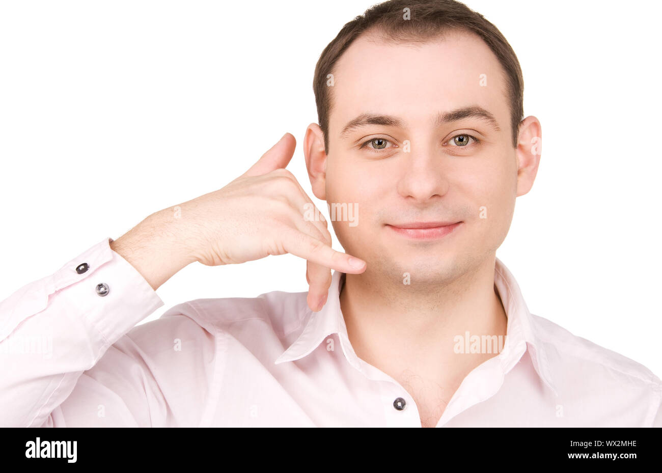 bright picture of businessman showing call me sign Stock Photo - Alamy