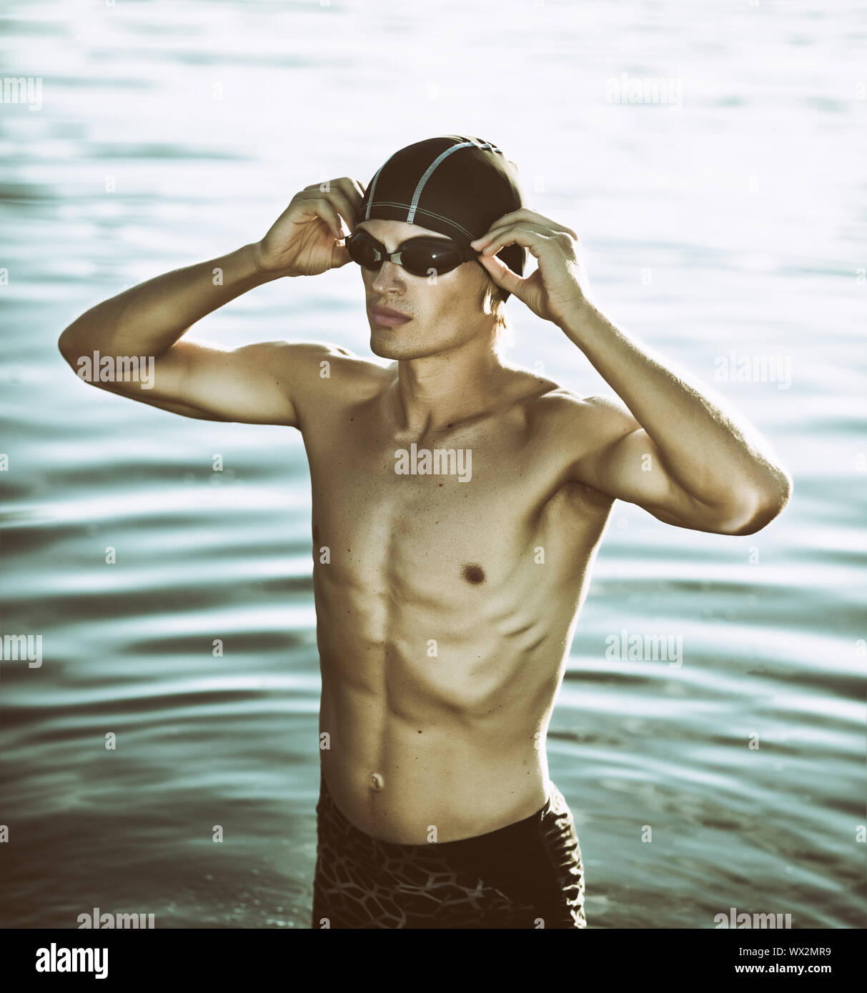 Male model in swimming pool hi-res stock photography and images - Alamy