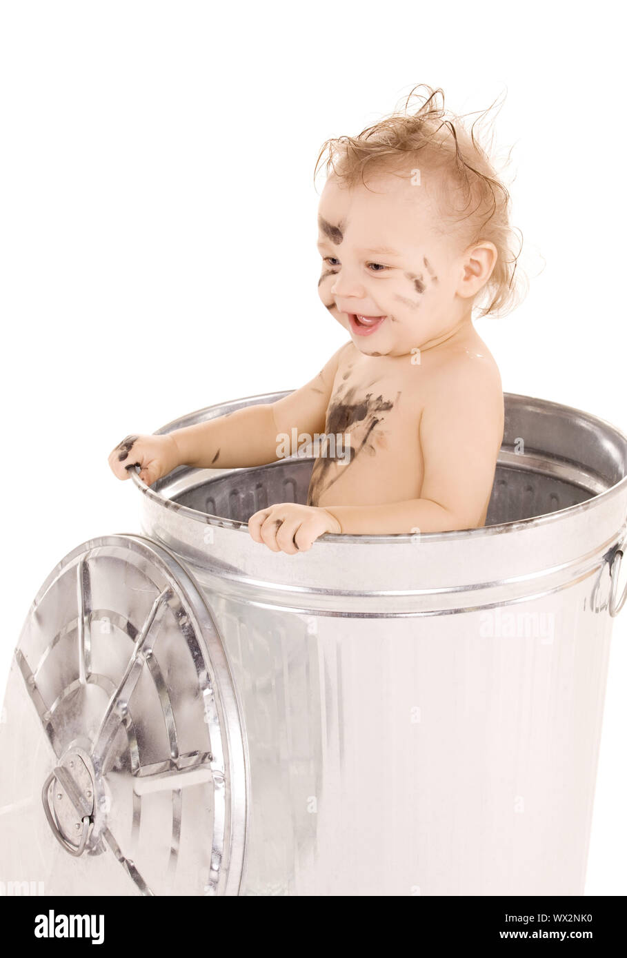 picture of adorable baby in trash can Stock Photo - Alamy