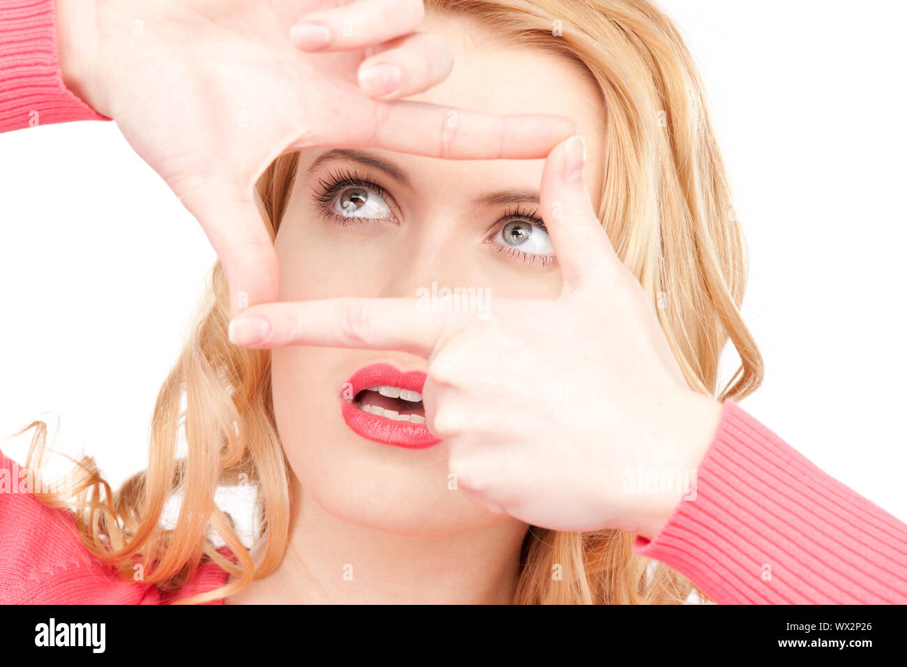 picture of lovely woman creating a frame with fingers Stock Photo - Alamy