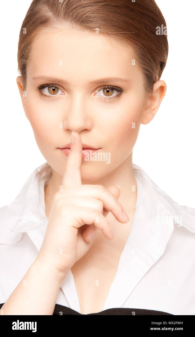 finger on lips Stock Photo - Alamy