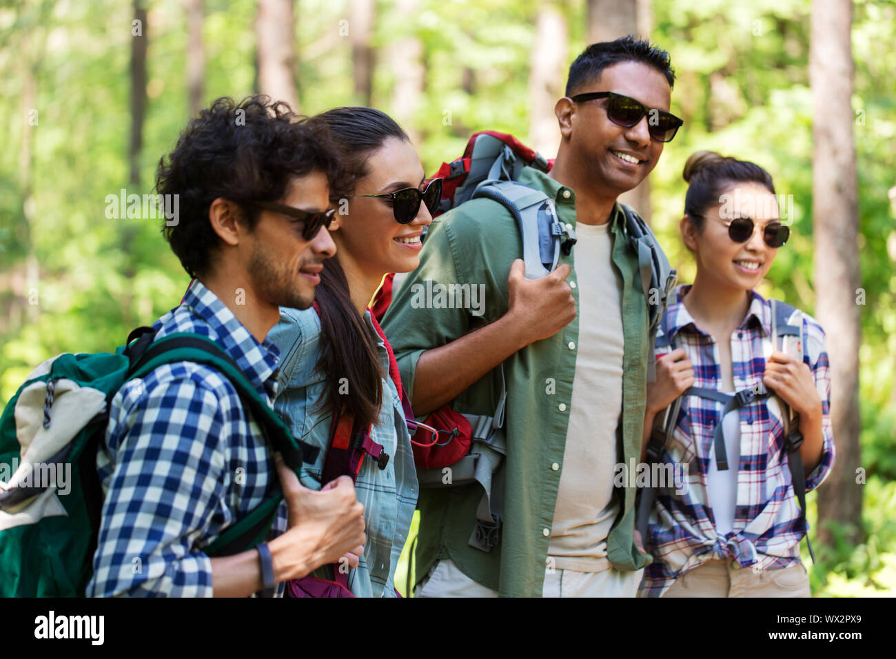 Friends backpacking hiking in hi-res stock photography and images - Alamy