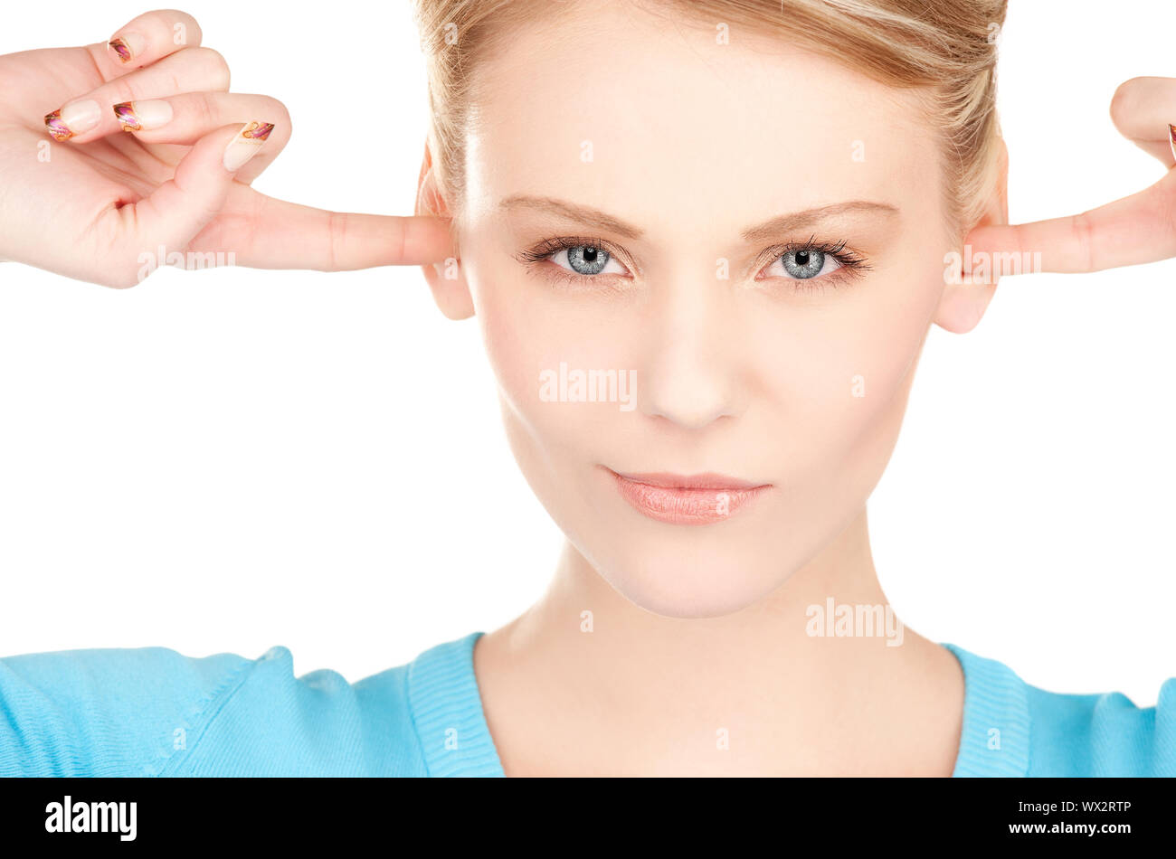 woman with fingers in ears Stock Photo - Alamy