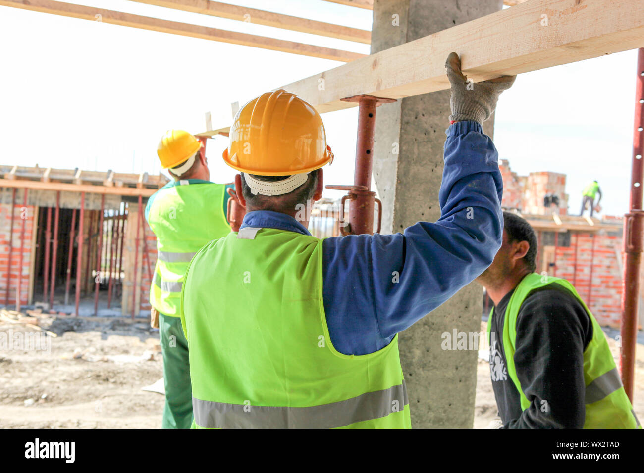 Construction worker on building site Stock Photo - Alamy