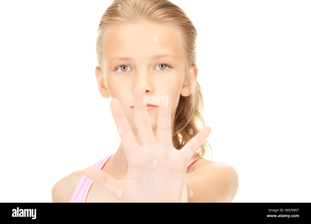 lovely girl showing stop sign Stock Photo - Alamy
