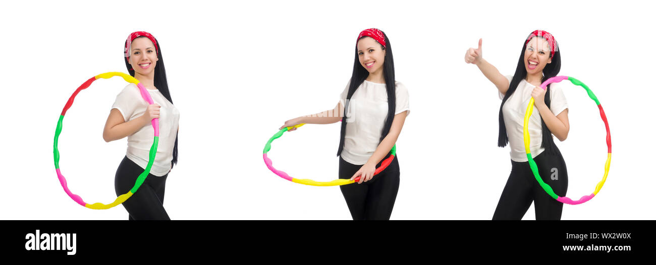 A girl in sport suit with hula hoop isolated on white Stock Photo - Alamy