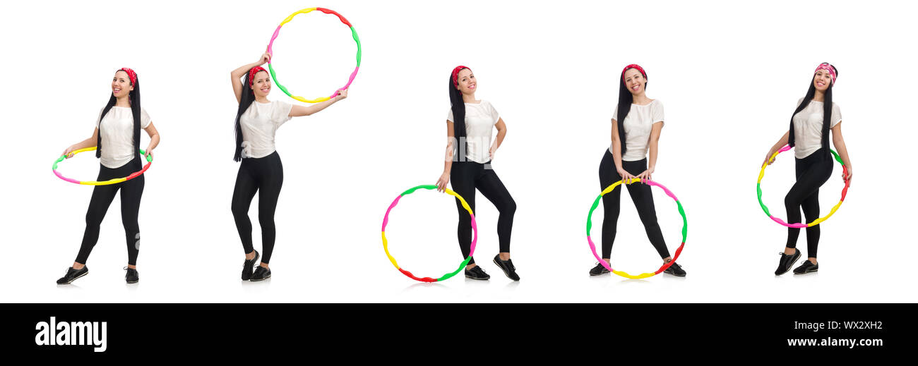 A girl in sport suit with hula hoop isolated on white Stock Photo - Alamy