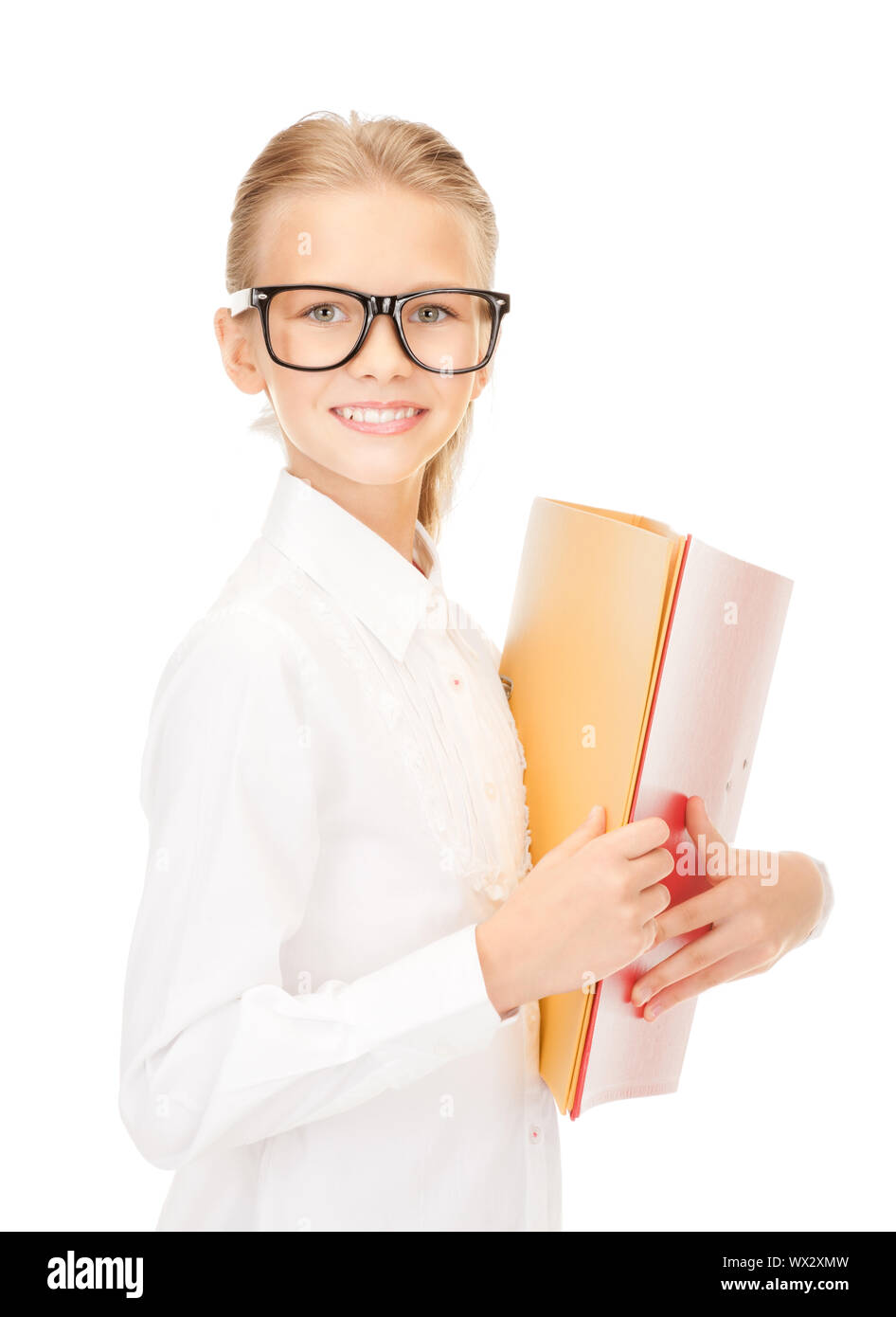 picture of an elementary school student with folders Stock Photo - Alamy