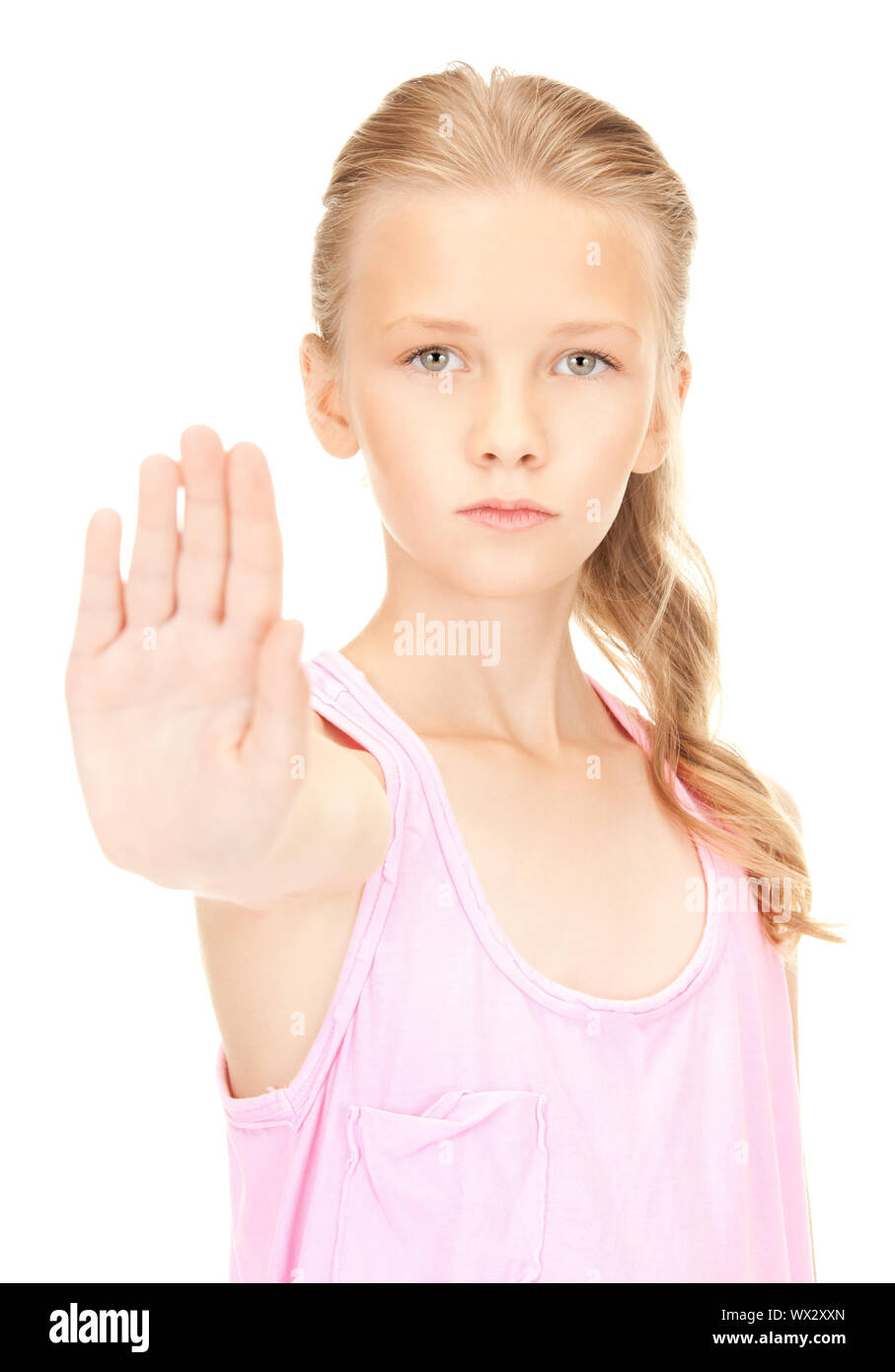 bright picture of lovely girl showing stop sign Stock Photo - Alamy