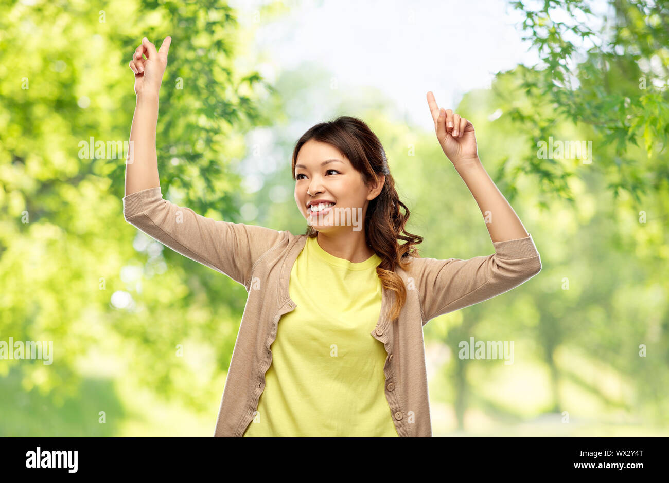 Asian woman dancing hi-res stock photography and images - Alamy