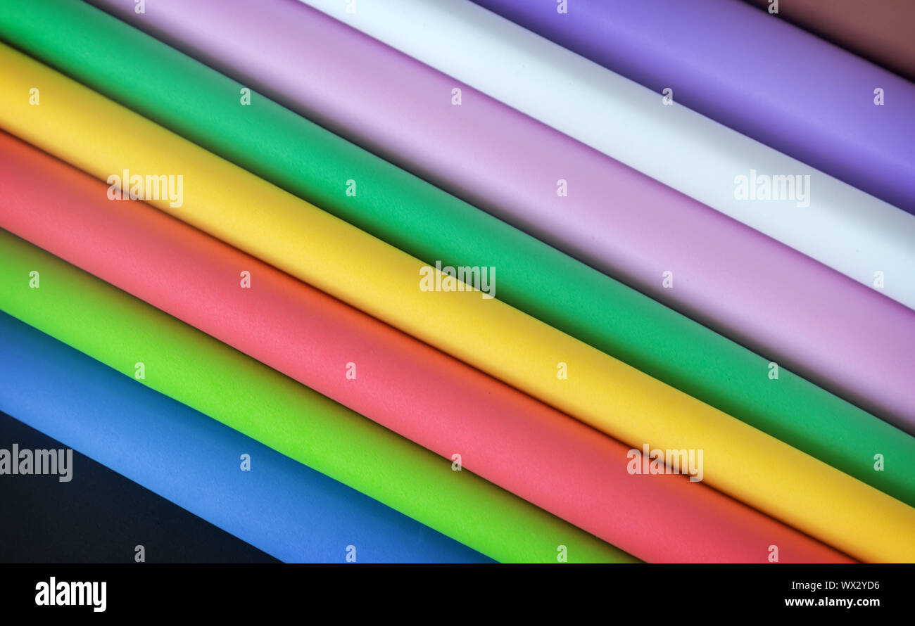 Folded sheets of paper in different colors Stock Photo - Alamy