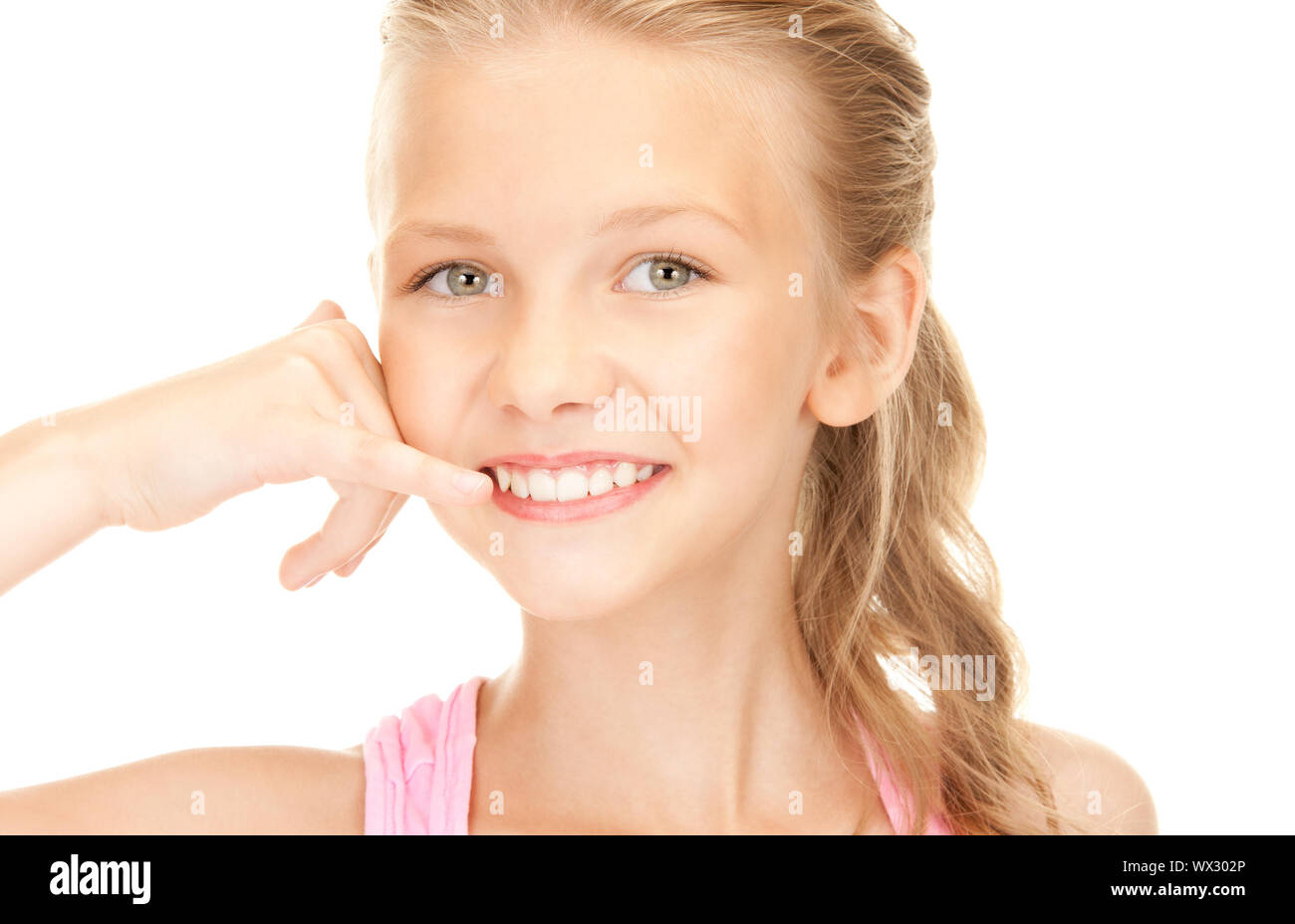 picture of pretty girl making a call me gesture Stock Photo - Alamy
