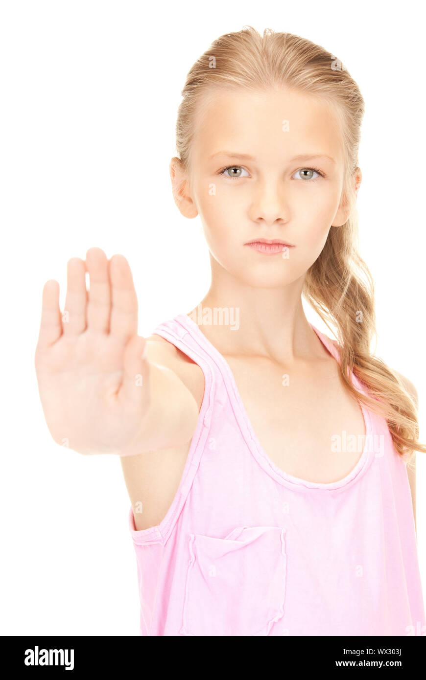 lovely girl showing stop sign Stock Photo - Alamy