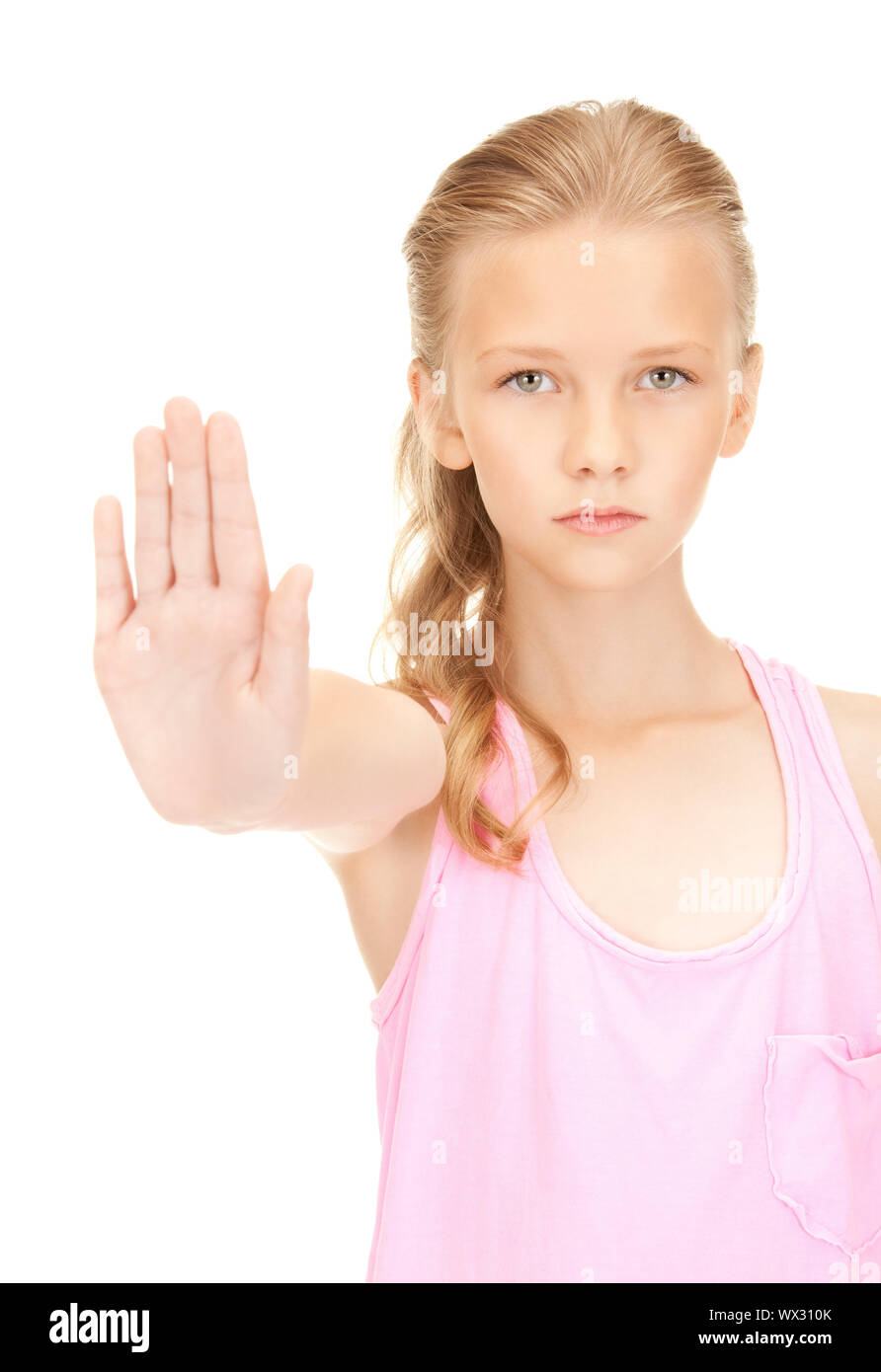 bright picture of lovely girl showing stop sign Stock Photo - Alamy