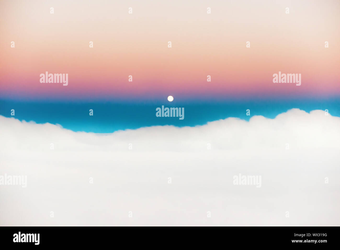 Sky and clouds at sunset with full moon rising Stock Photo - Alamy