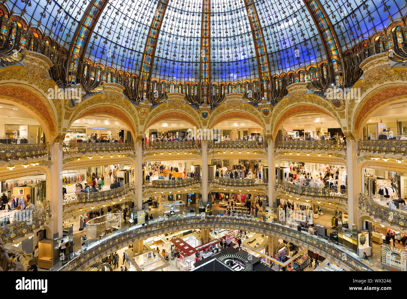 People shopping in luxury Lafayette department store of Paris, France ...