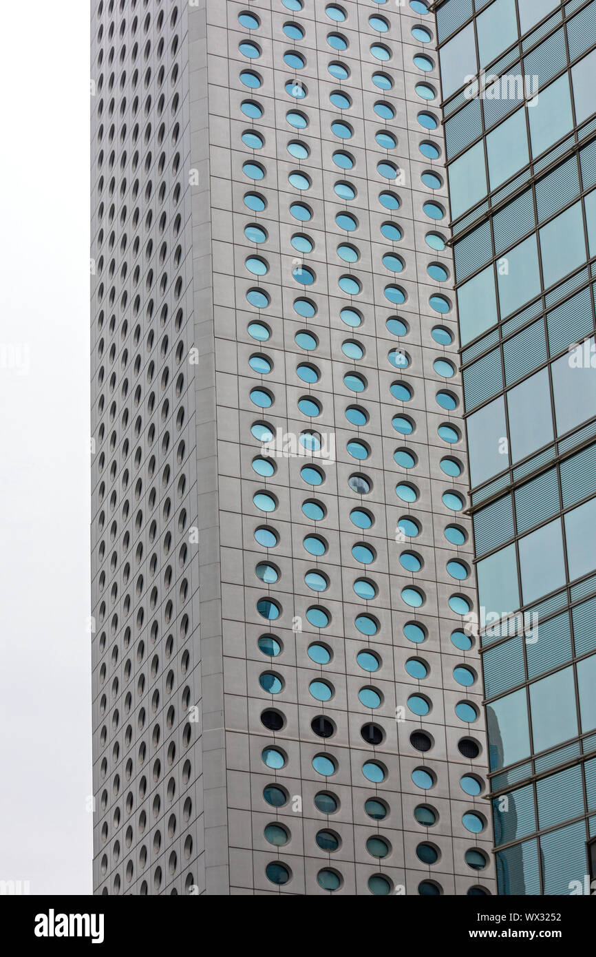 Modern Skyscraper Building With Many Round Windows in Hong Kong Stock ...