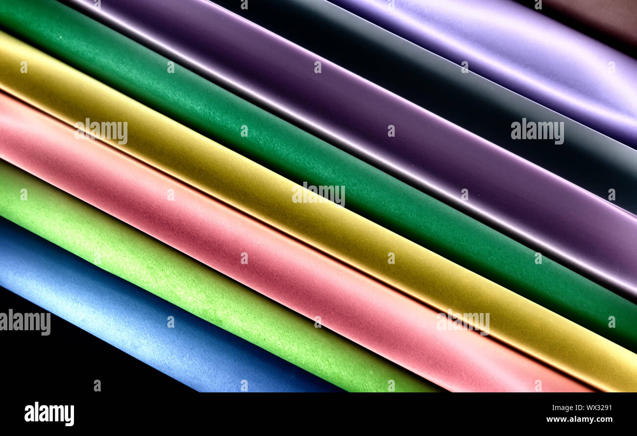 Folded sheets of paper in different colors Stock Photo - Alamy