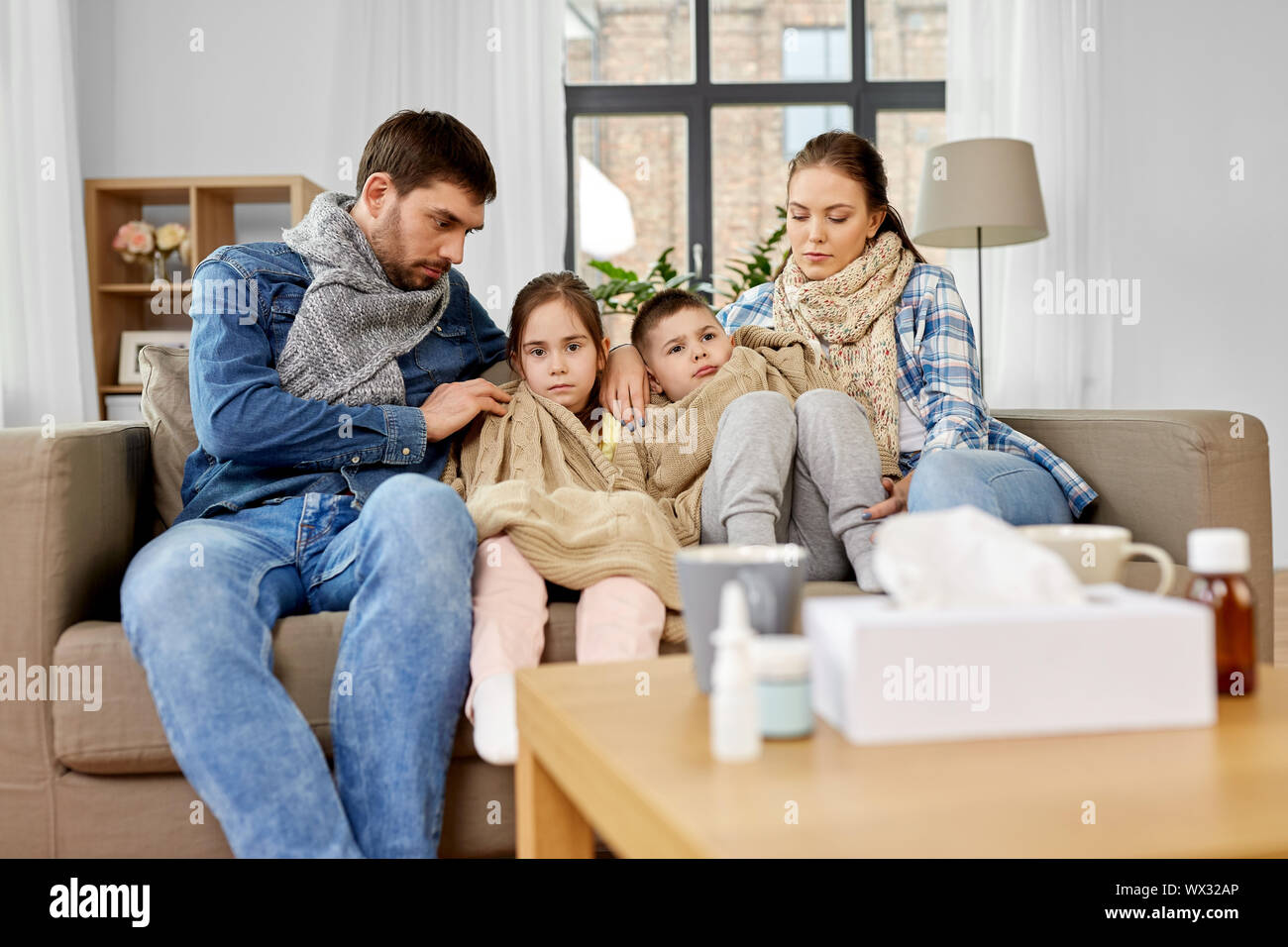 sick family with children having flu at home Stock Photo - Alamy