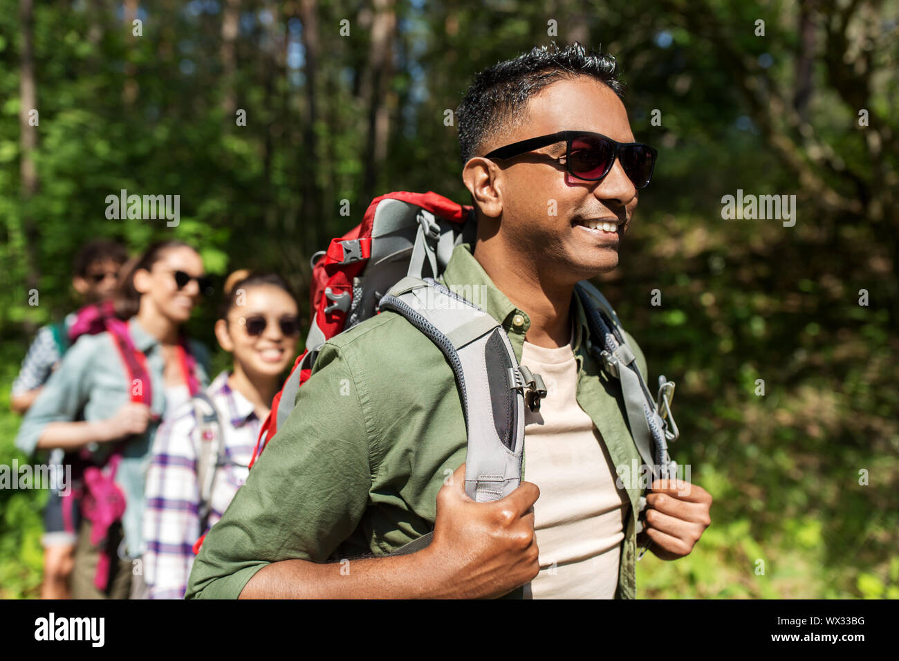 Friends backpacking hiking in hi-res stock photography and images - Alamy